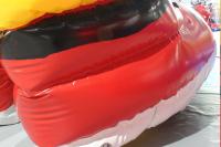 China EN14960 Colorful PVC Fire Retardant Inflatable Running Shoes for sale