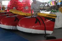 China EN14960 Colorful PVC Fire Retardant Inflatable Running Shoes for sale