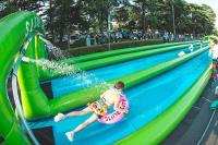 China Customized 100m Long Outdoor Inflatable Water Sports Game City Slide For Adults for sale