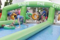 China Customized Three Lanes Inflatable City Slide For Outdoor Sports Game for sale