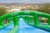 China Customized Three Lanes Inflatable City Slide For Outdoor Sports Game for sale