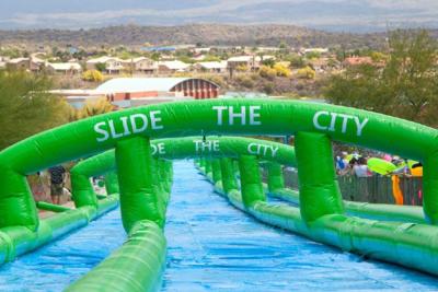 China Customized Three Lanes Inflatable City Slide For Outdoor Sports Game for sale