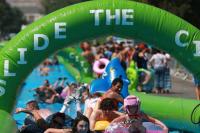 China Customized Three Lanes Inflatable City Slide For Outdoor Sports Game for sale