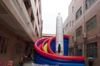 China Rotating Inflatable Water Slide With Rocket Outdoor Moonwalk Waterslide Sliding Fun for sale
