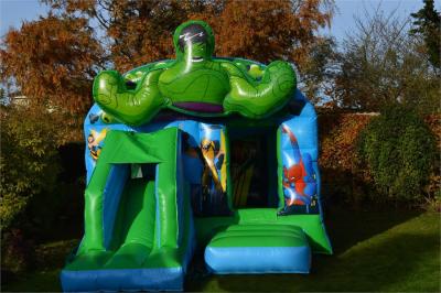 China Kids Inflatable Green Super Heroes Castle Jumping House With Slide for sale