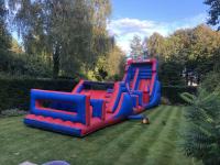 China Lead Free Inflatable Obstacle Courses 60ft With Slide for sale