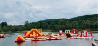 China Colorful Inflatable Water Equipment Obstacle Bouncy Castle For 110 Person for sale