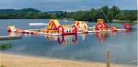 China Colorful Inflatable Water Equipment Obstacle Bouncy Castle For 110 Person for sale
