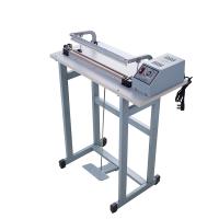 China Through Type Foot Pedal Bags Pedal Sealing Machine with Food Grade Cutter and Sealer for sale
