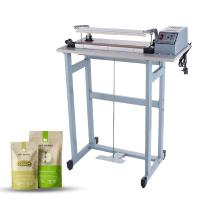 China Through Type Foot Pedal Bags Pedal Sealing Machine with Food Grade Cutter and Sealer for sale