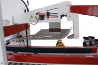 China Sealing Width 48-75mm Auto Flapper Carton Folding And Sealing Machine for Heavy Boxes for sale