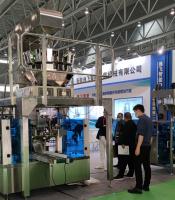 China 10 Weigh Heads Fill Roll Vertical Packing Machine for Peanut Twist Snack Candy 350 KG for sale