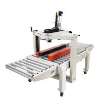 China Compact and Durable Semiautomatic Corner Side Edge Carton Box Taping Sealing Machine for sale