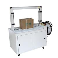 China Stainless Steel Low Table Packer Strapping Machine With Conveyor Line for sale