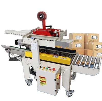 China Left and Right Drive Carton Sealing Machine for Packaging Apply Carton Height 90-420mm for sale