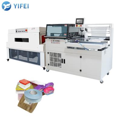 China Side Sealing Heat Shrink Film Wrapping Packing Machine for Fireworks Boxes and Egg Tray for sale