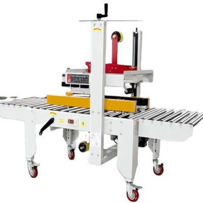 China 1830*670*1230mm Semi Automatic Left and Right Drive Belt Carton Tape Sealing Machine for sale