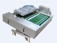 China Plastic Packaging Material Conveyor Belt Vacuum Sealing Machine for Meat Fish Chicken for sale