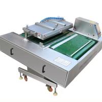 China Electric Driven 1000 Double Strip Auto Bean Products And Wild Vegetables Continuous Vacuum Packing Machine for sale