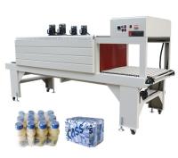 China TFB650 High Speed Bottles Cuff Heat Shrinkage Film Packaging Machine with Consumption for sale