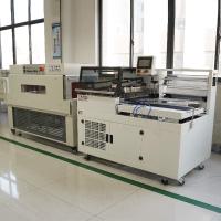 China POF/PVC Film 450L 1350W L Bar Shrink Film Bag Wrapping Machine for Packaging Solutions for sale
