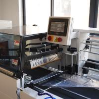 China POF/PVC Film 450L 1350W L Bar Shrink Film Bag Wrapping Machine for Packaging Solutions for sale