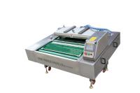 China Automatic Continous Rolling Belt Type Vacuum Packaging Machine for Fruit Meat Fish Chicken for sale