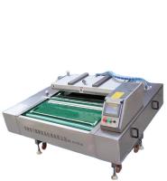 China Continuous Rolling Belt Type Food Vacuum Sealer for Bags Max Package Size 1000*420*9mm for sale