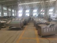 China Continuous Belt Type Roll Vacuum Packaging Machine for Dried Shrimp and Smoked Salmon for sale