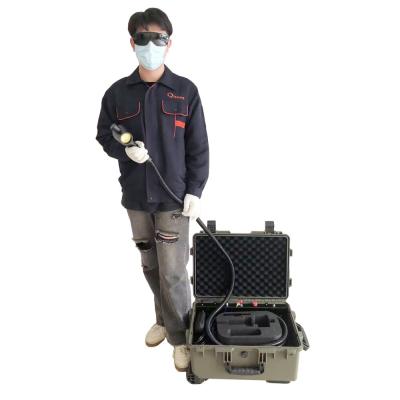 China 100w Suitcase Portable Fiber Laser Cleaning Machine Outdoor Remote Operation for sale