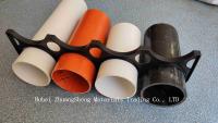 China Plastic PE Pipe Fittings Pipe Retainer Lower Pipe Holder Stacked In Multiple Layers for sale
