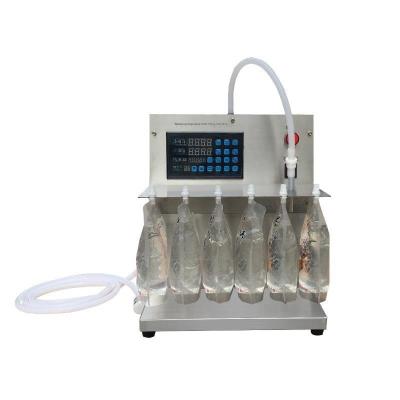 China Compact and High Productivity Semi-automatic Water Filling Machine for Small Bottles for sale