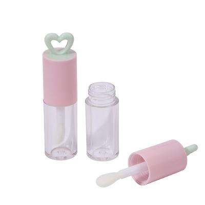 China Custom Color 7ml Hollow Heart Plastic Lip Glaze Tube for Portable Lip Gloss Packaging for sale