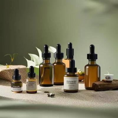 China Amber Essential Oil Bottle 5ml to 100ml with Plastic Dropper Head and Glass Pipette for Travel & Storage for sale