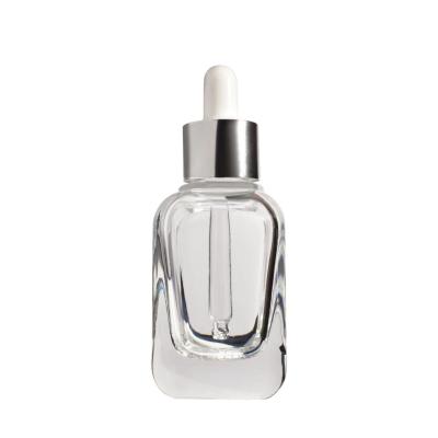 China Empty Glass Essential Oil Bottle with Dropper 10ml 20ml Aluminum Gold Silver Skirt for sale