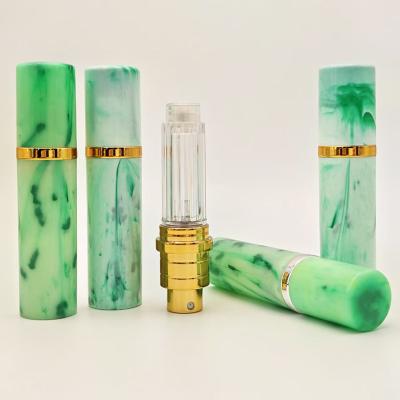 China Customized 5ML Portable Marbling Plastic Perfume Spray Pen with Aluminum Sprayer - Compact Travel Fragrance Container for sale
