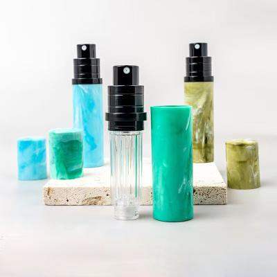 China Marble-Effect Perfume Spray Bottle and Travel-Friendly Fine Mist Atomizer for Elegant Fragrance Packaging for sale
