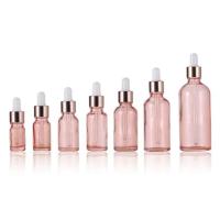 China 10ml-100ml Pink Glass Essential Oil Dropper Bottle with UV Protection and Precision Dispenser for sale