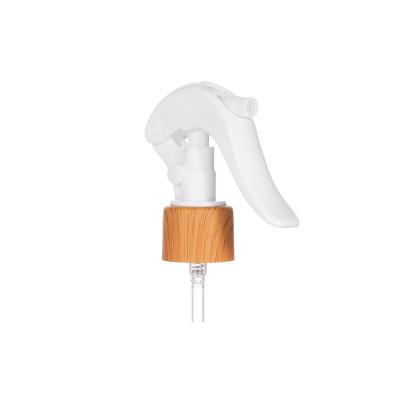 China Wooden Circle Mini Trigger Sprayer 24/410 28/410 Button Type for Bottles for sale