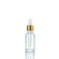 China Wholesale Clear Glass Dropper Bottle 5ml to 200ml with Aluminum Gold Skirt for sale