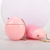 China 50ml Egg-Shaped Sunscreen Bottle with Detachable Gold Chain Custom PP Plastic Cosmetic Packaging for sale