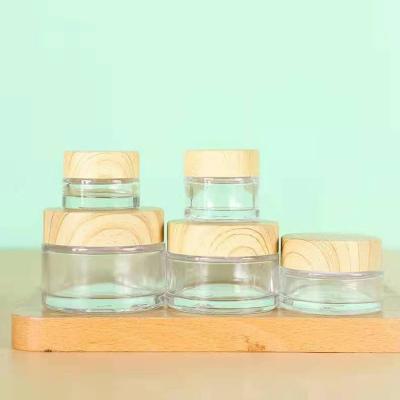 China 5g 10g 15g 30g 50g Empty Frosted Glass Cream Jars Cosmetic Natural Wood  Containers for Eye Cream Face Mask for sale