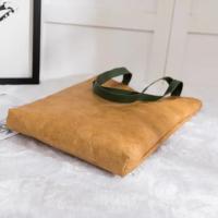 China Brown Tyvek Paper Washable Tote Bags Sustainable Bio Degradable With Leather Handle Strap for sale