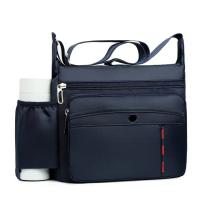 China Black OEM ODM Messenger Crossbody Bag With Bottle Holder Pocket for sale
