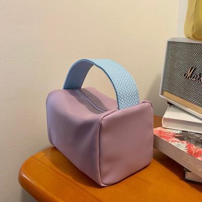 China Handheld New Pastel-Colored PU Leather Large Capacity Makeup Bag Organizer Storage Pouch Cosmetics Women's Toiletry Bag for sale