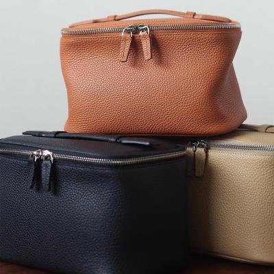 China New Arrival Leather Makeup Bag Portable Large Capacity Professional Travel & Business Trip Handheld Cosmetic Storage Case for sale
