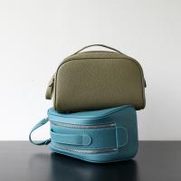 China 2026 New Lychee-Textured Vintage Colors PU Leather Cosmetic Bag Women's Portable Travel Toiletry Bag High-End Organizer for sale