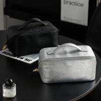 China Women's Large Capacity Portable Luxury Makeup Bags 2025 New Silver Waterproof Toiletry Travel Daily Organizer Cosmetic Pouch for sale