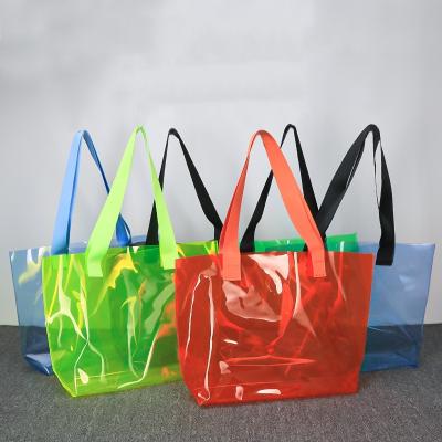 China PVC Handheld Shopping Bags Clear Waterproof Large Capacity Shopping Bags Fashion-Worthy Colorful Gift Bag with Custom LOGO for sale