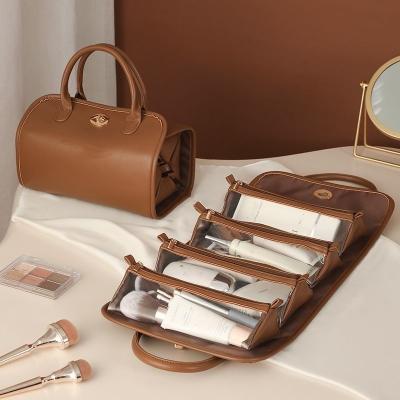 China Foldable Niche Portable Retro Luxury Detachable Minimalist Makeup Organizer Bag Waterproof PU Leather Cosmetic Bag 2026New Style for sale